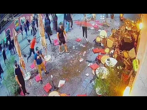 Violent brawl between football fans shakes central Brussels - YouTube
