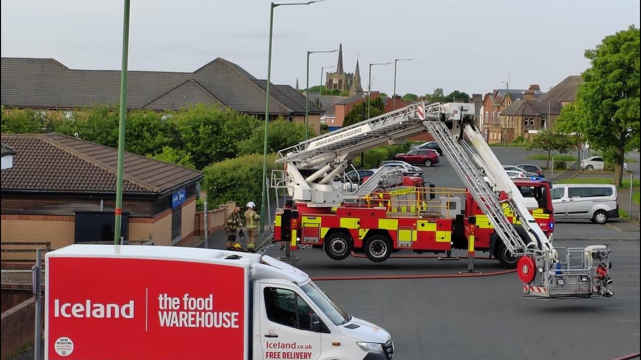 Emergency services rush to Iceland store fire - YouTube