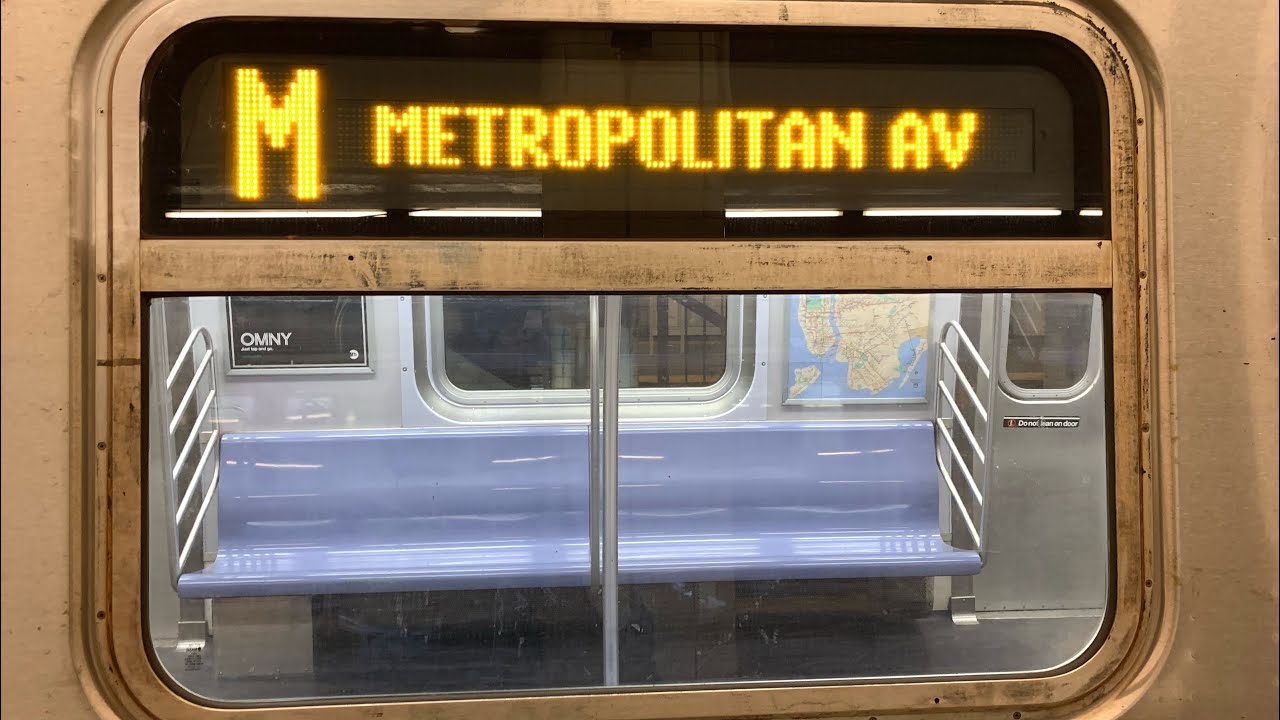 On board a Metropolitan Avenue bound R160 M train from Chambers Street ...