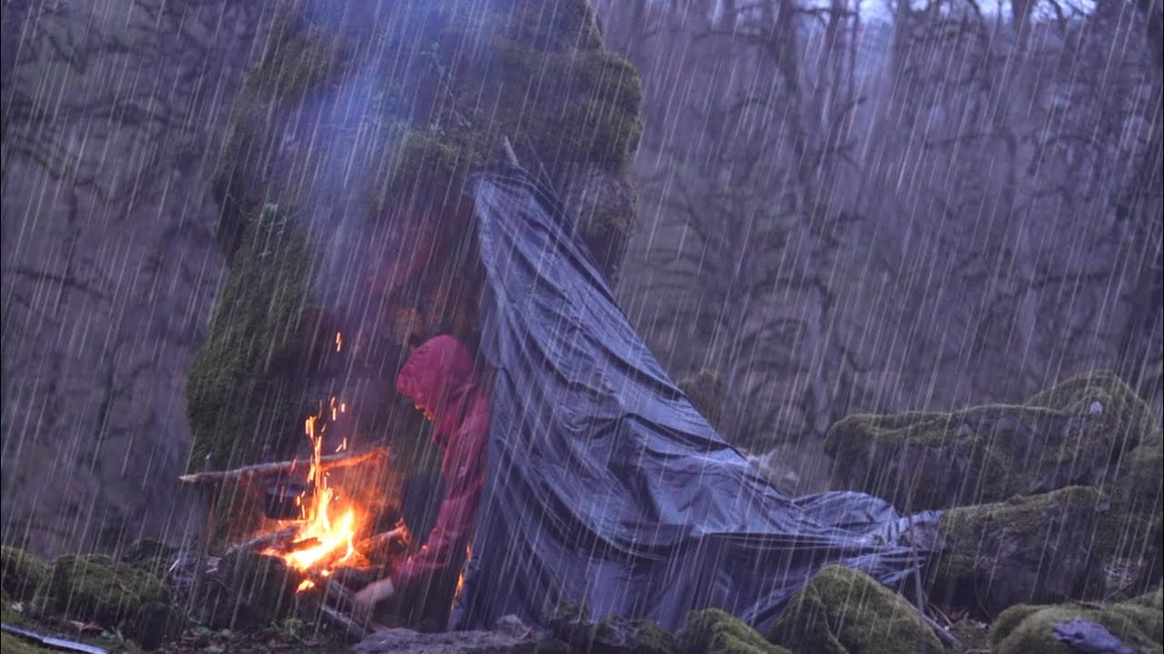 SOLO CAMPING in RAINSTORM in HOT SHELTER under a rock - YouTube