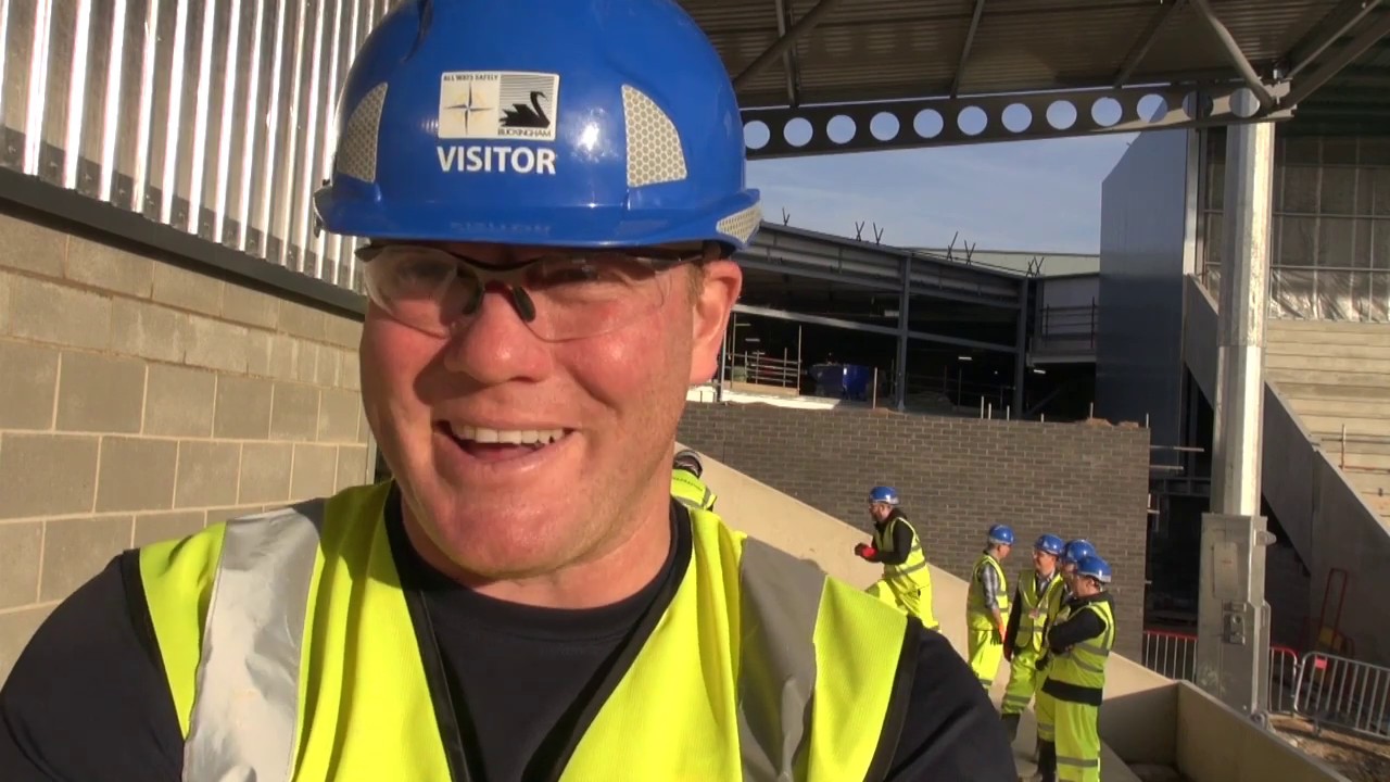 First seats installed at Community Stadium - YouTube