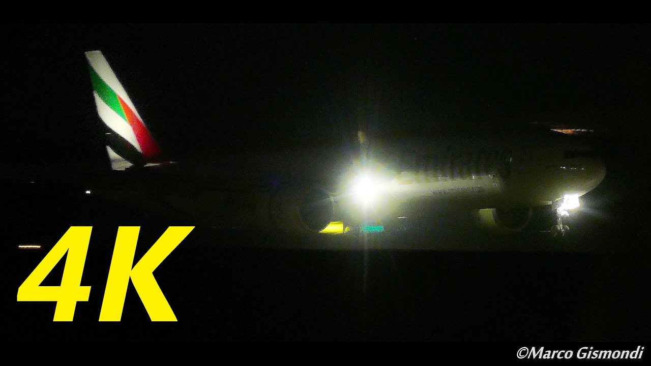 Emirates 777-300ER night landing-takeoff at Rome - YouTube