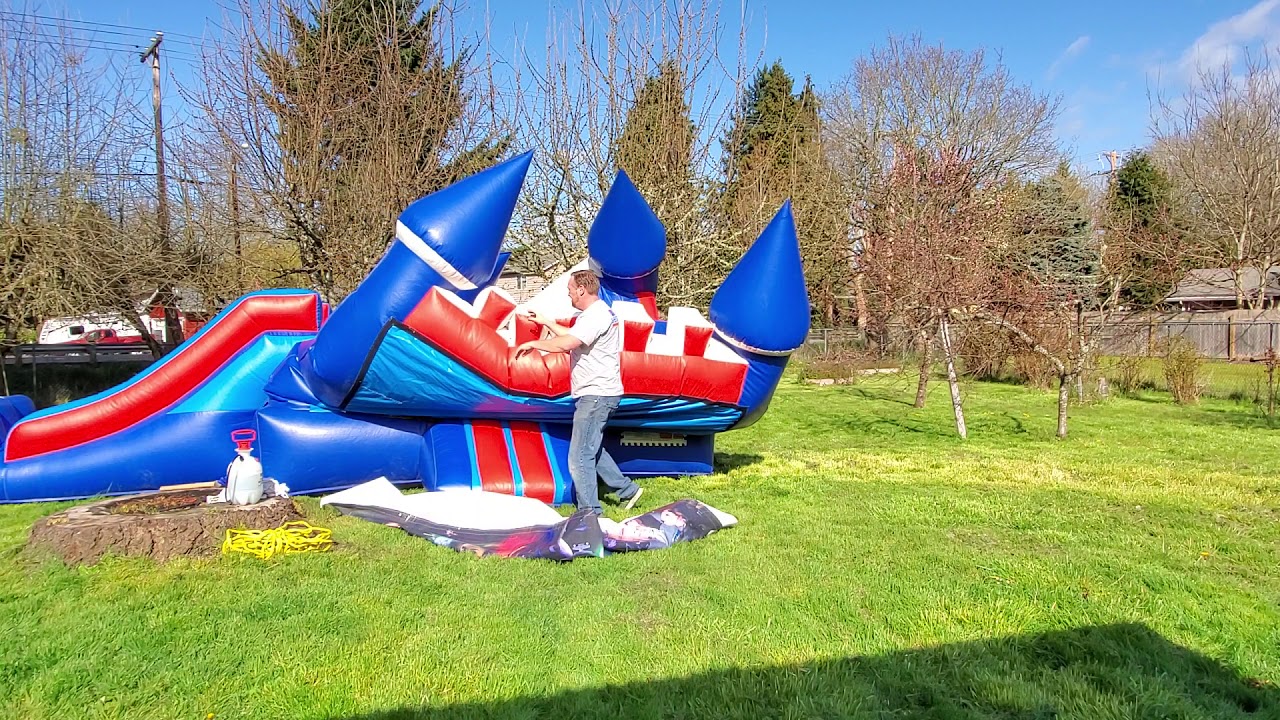 Time lapse full bounce house set up 1 - YouTube