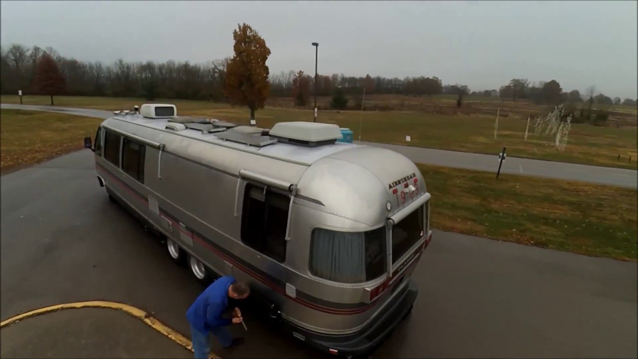 Drone flying above an Airstream Classic 36 Motorhome - YouTube