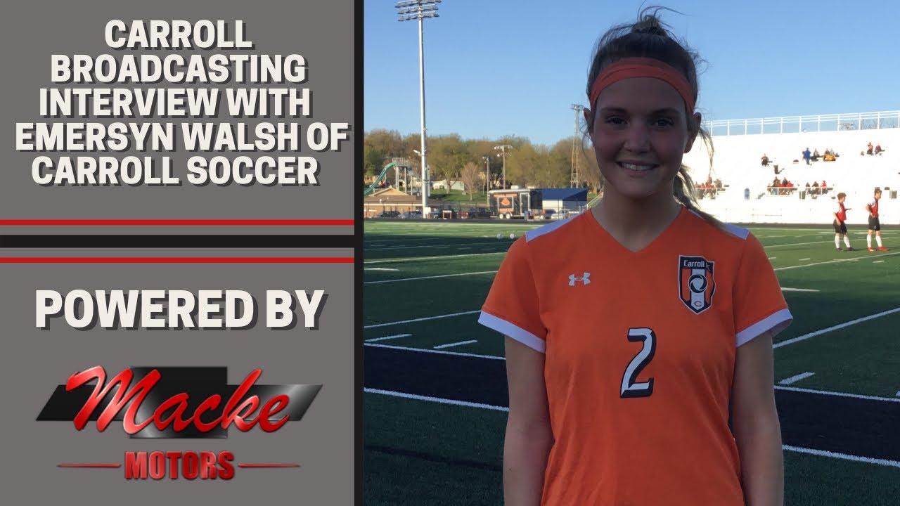 Tyler Brunner talks with Emersyn Walsh of Carroll Soccer after match ...