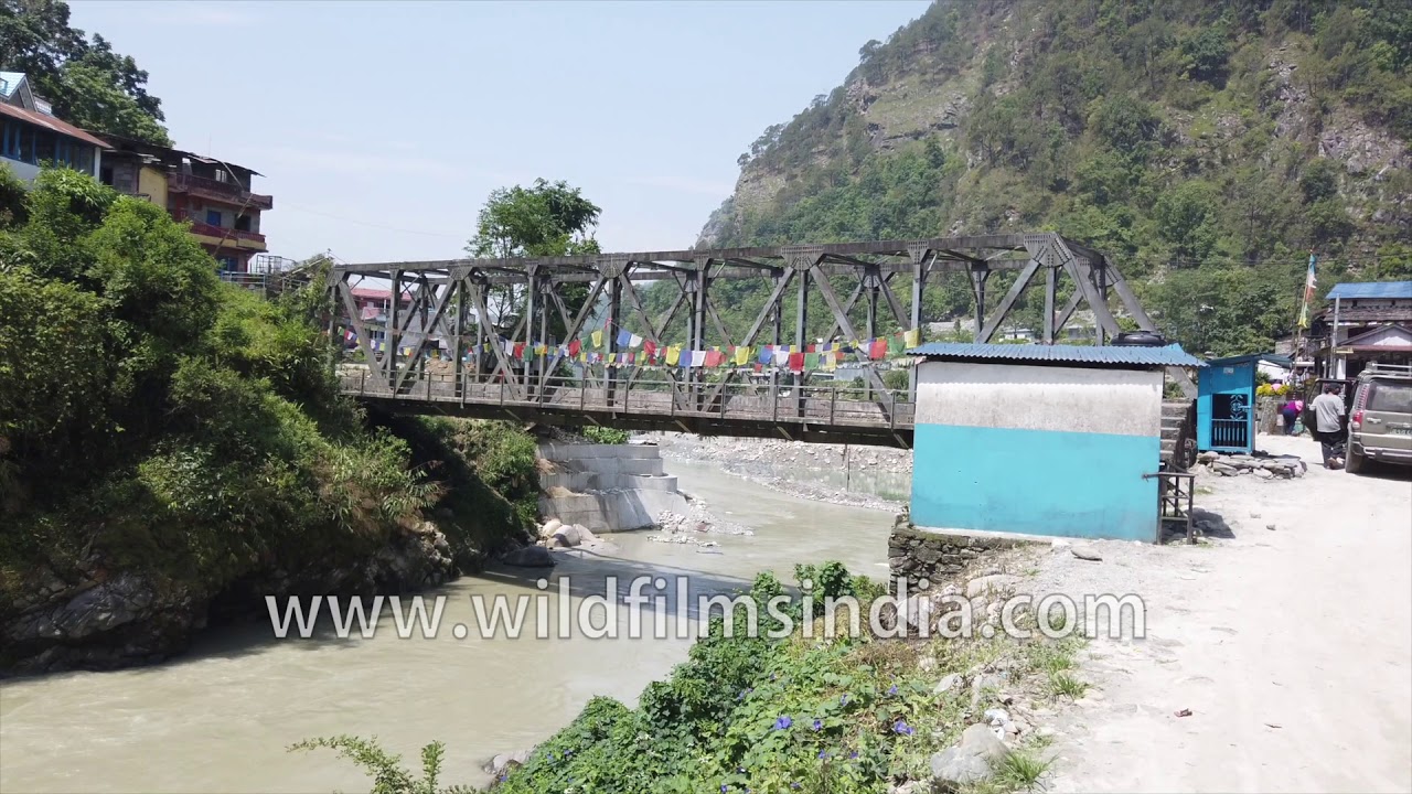 River Modi flowing under the Modi Khola Bridge in Birethanti, Nepal ...