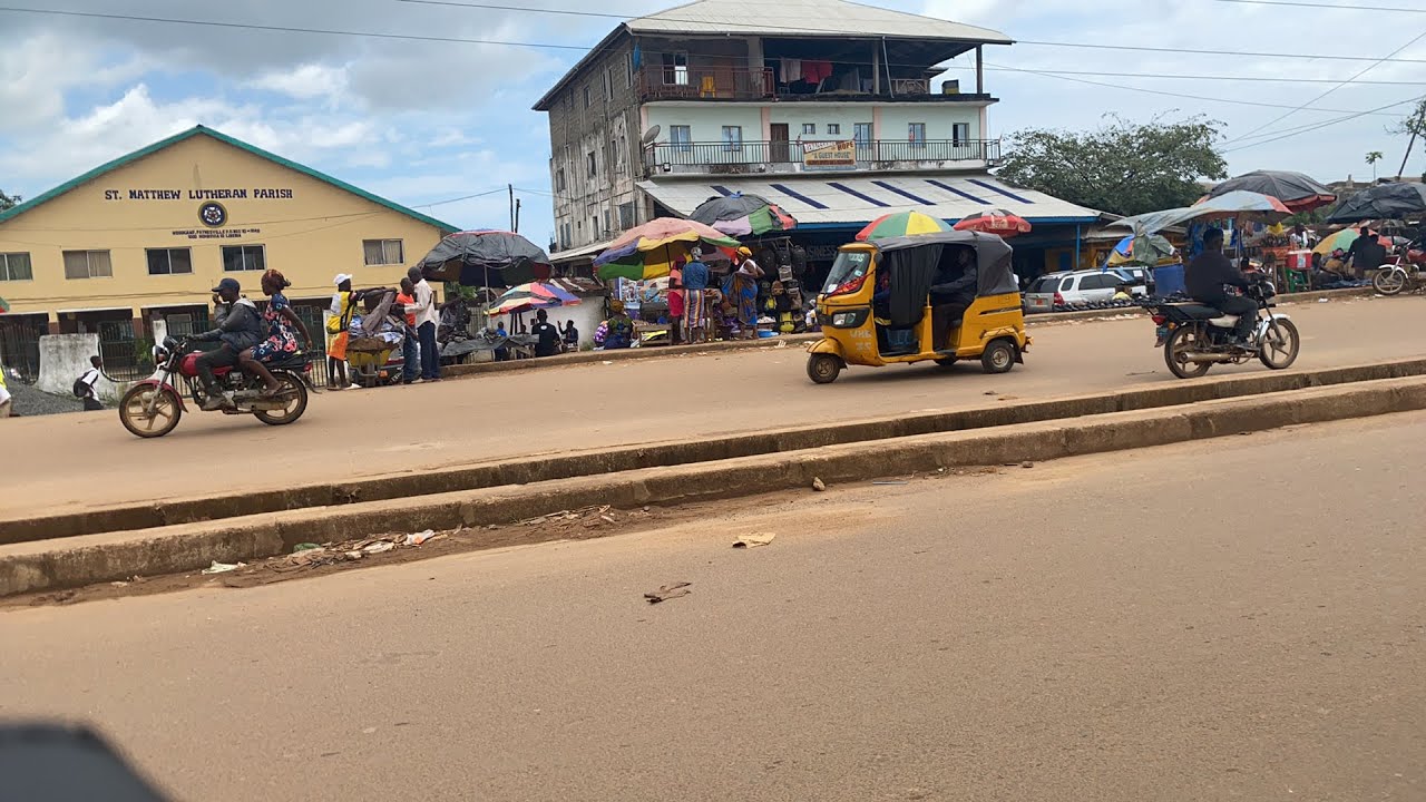 Walking in Redlight market Liberia - YouTube