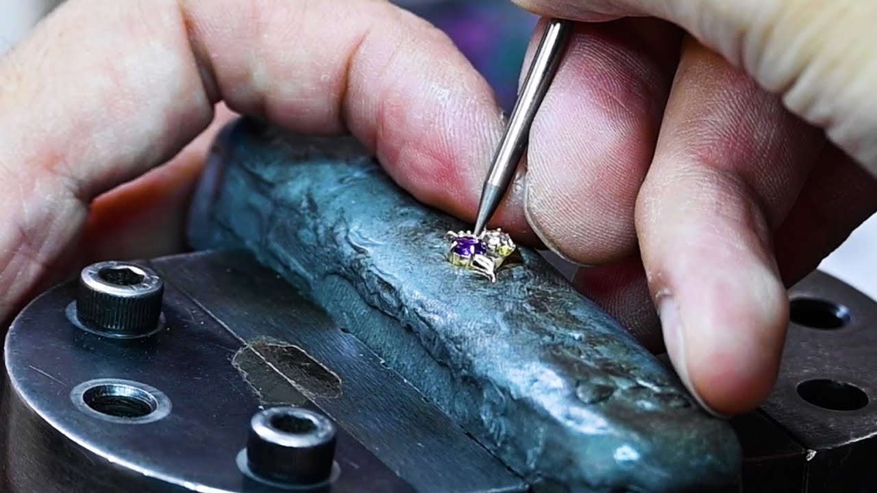 The process of making jewelry 10,000 pieces per month. Old factory in ...
