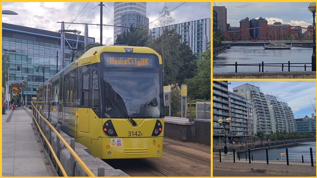 Trams with cool backdrop of Media City, Salford - YouTube