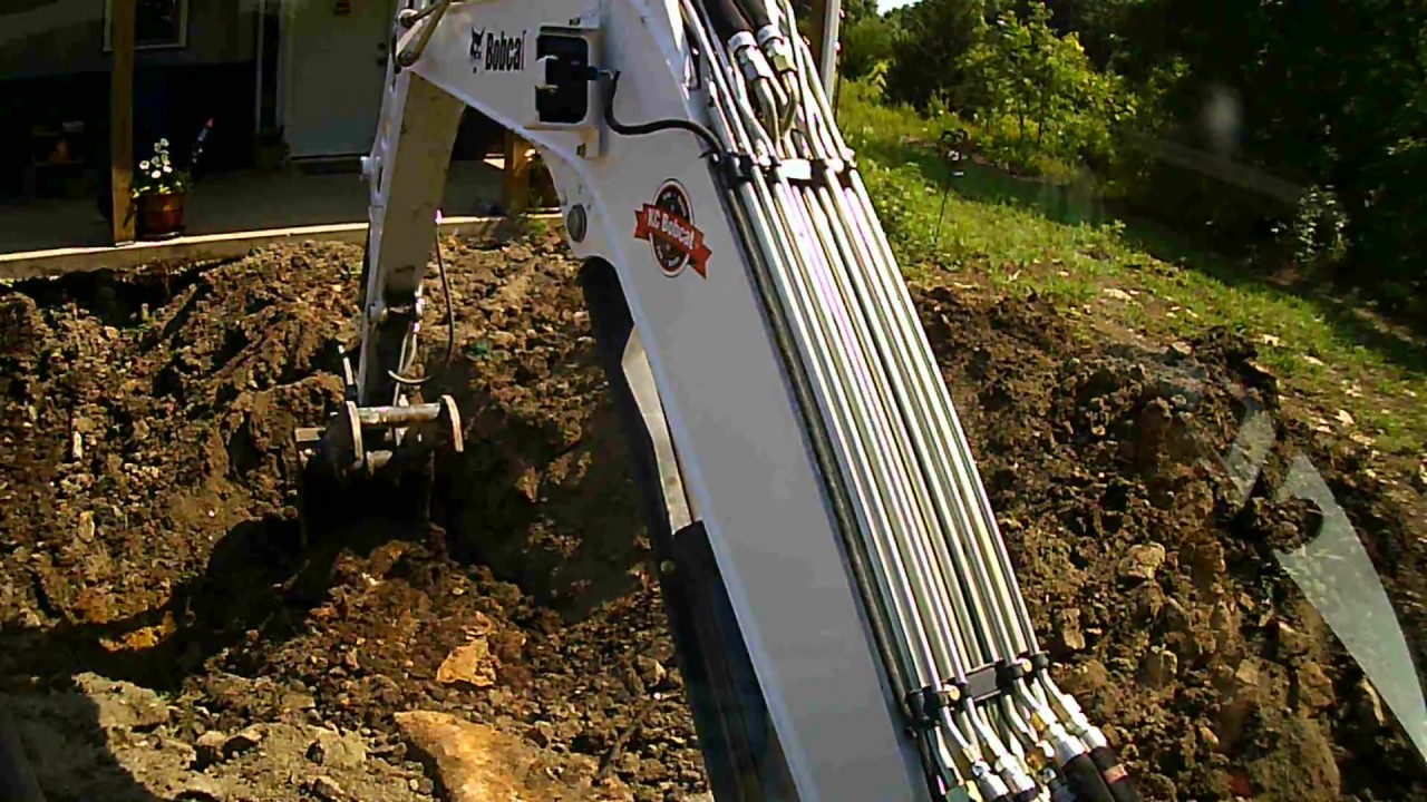 E 50 Bobcat digging cistern - YouTube