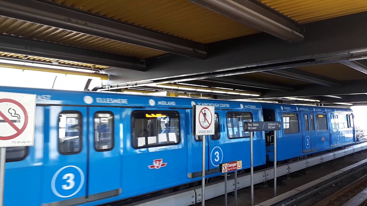 Scarborough RT train ariving Scarborough town centre with signs and ...