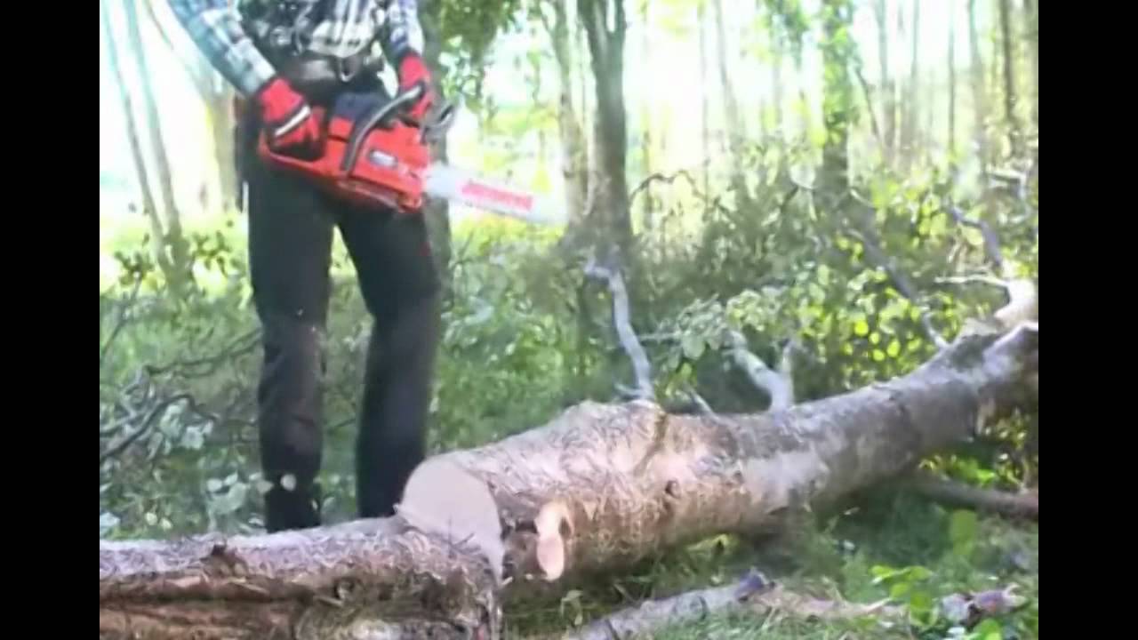 5 of 7: Cross Cutting with your Jonsered Chain Saw - YouTube