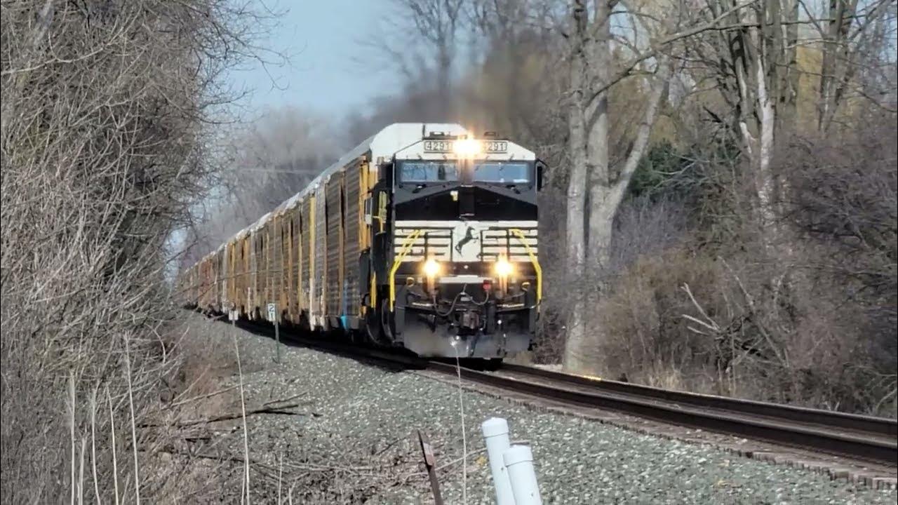 NS 31M heading south with a high hood geep and manifest on the back caught in Rockwood on 3/14 ...