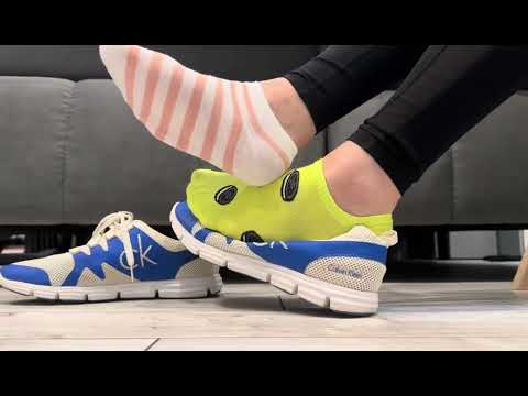 Calvin Klein running shoes with mismatched socks outfit