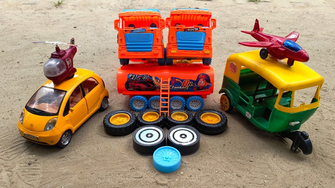 In the ground tractor, oil tanker, auto rickshaw, helicopter find toy ...