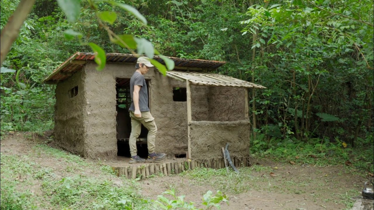 full video build a complete shelter in the forest.The hut is made of ...
