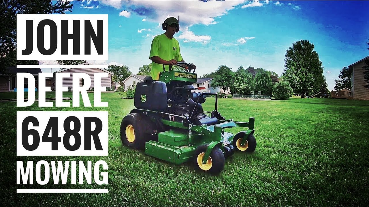 Mowing with the John Deere 648R - YouTube