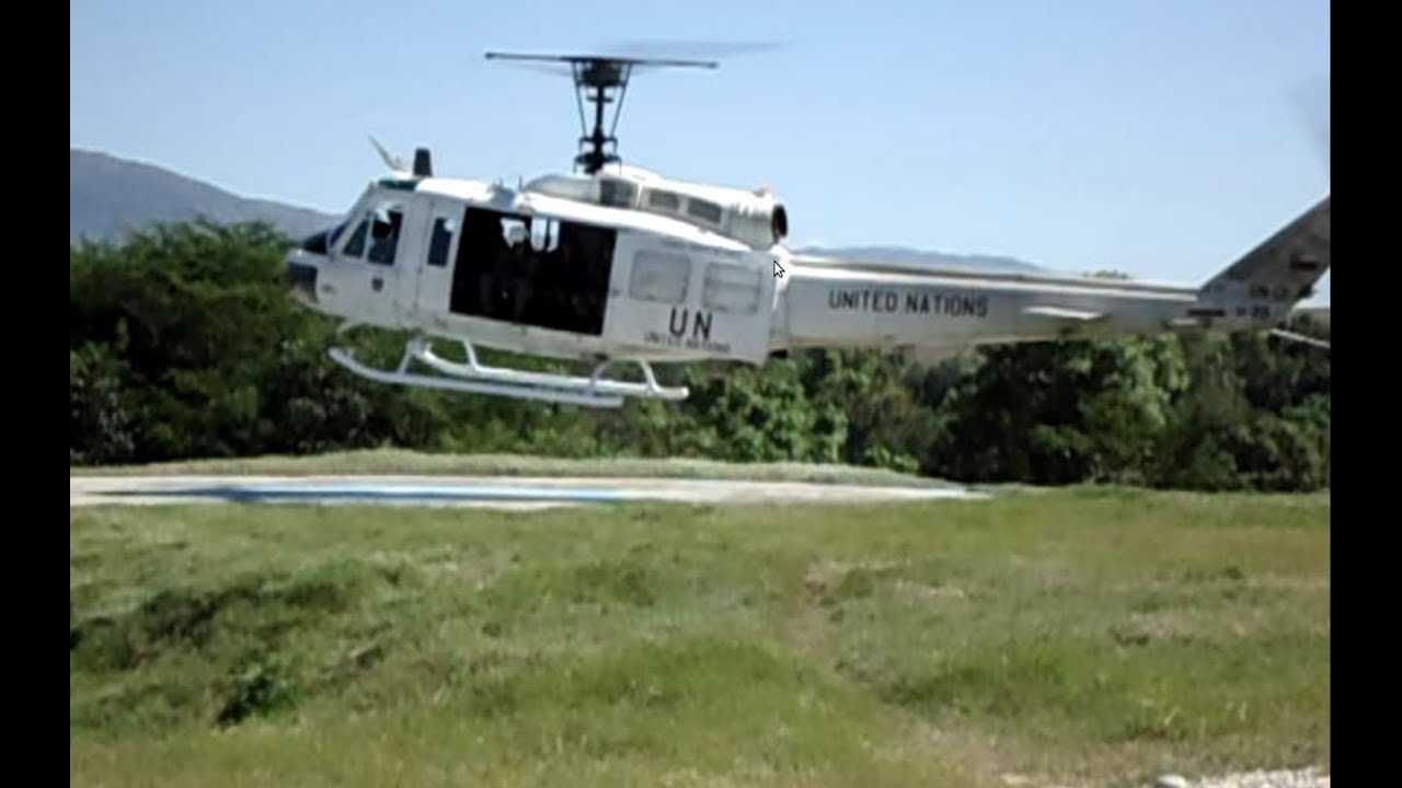 Bell Huey UH-1 Helicopter Start up Dust off - Mirabalais - Haiti - YouTube