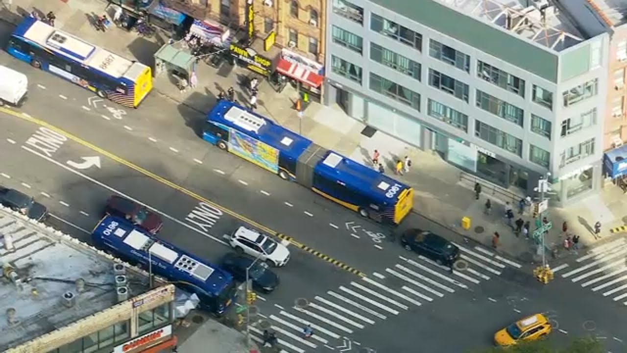 Two MTA buses stuck by bullets in Manhattan - YouTube