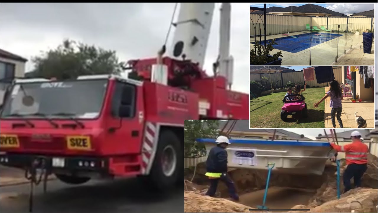 Backyard transformation/big crane lifting swimming pool over the house ...