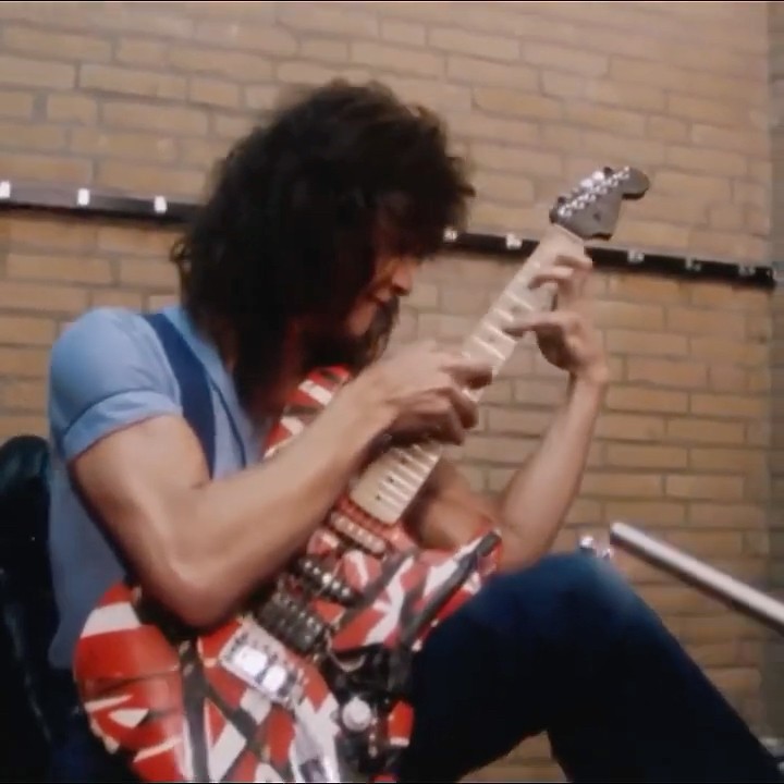 Eddie Van Halen performing a solo section from "Spanish Fly" backstage ...