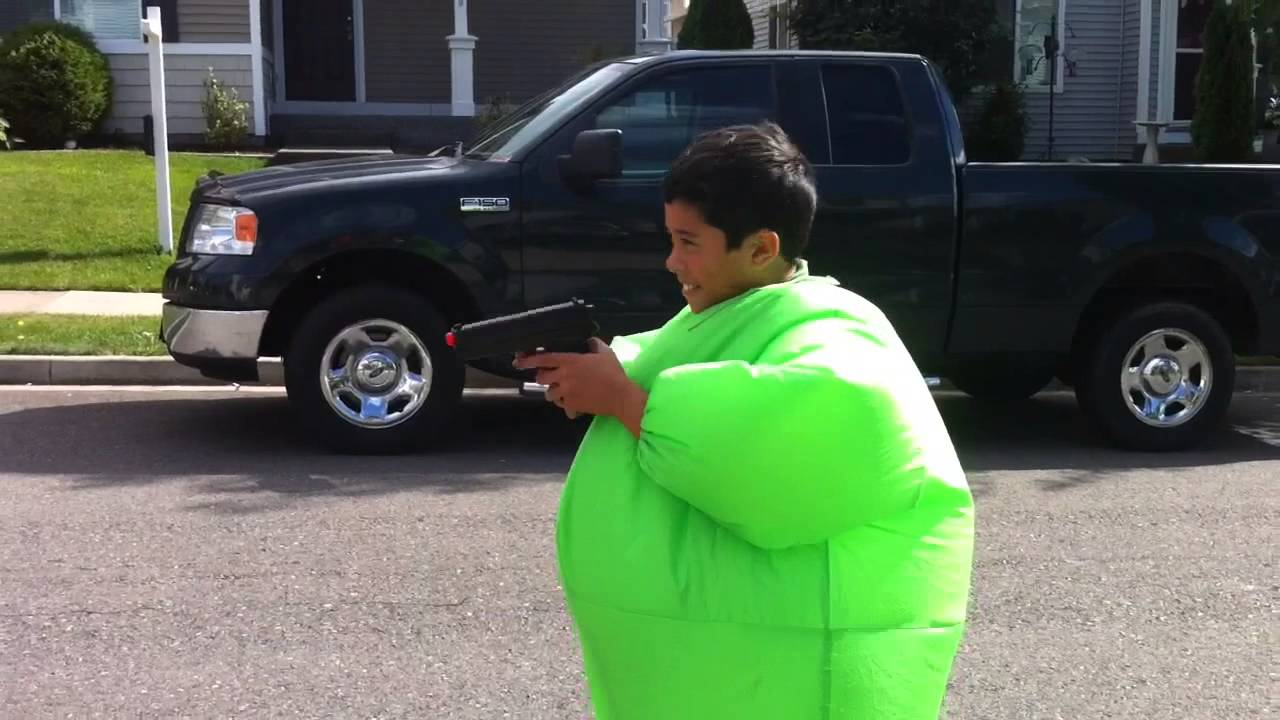 Fat guy shooting a gun - YouTube