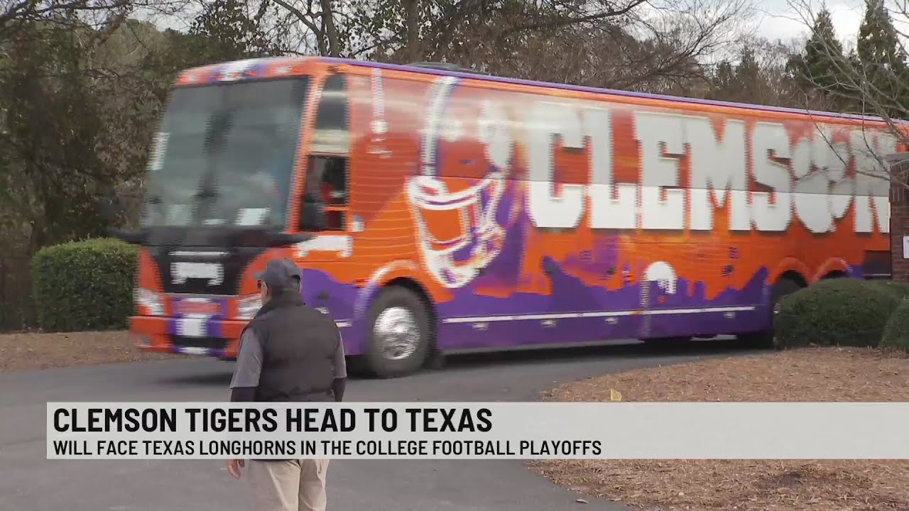 Tigers depart Clemson ahead of playoff game against Texas - YouTube