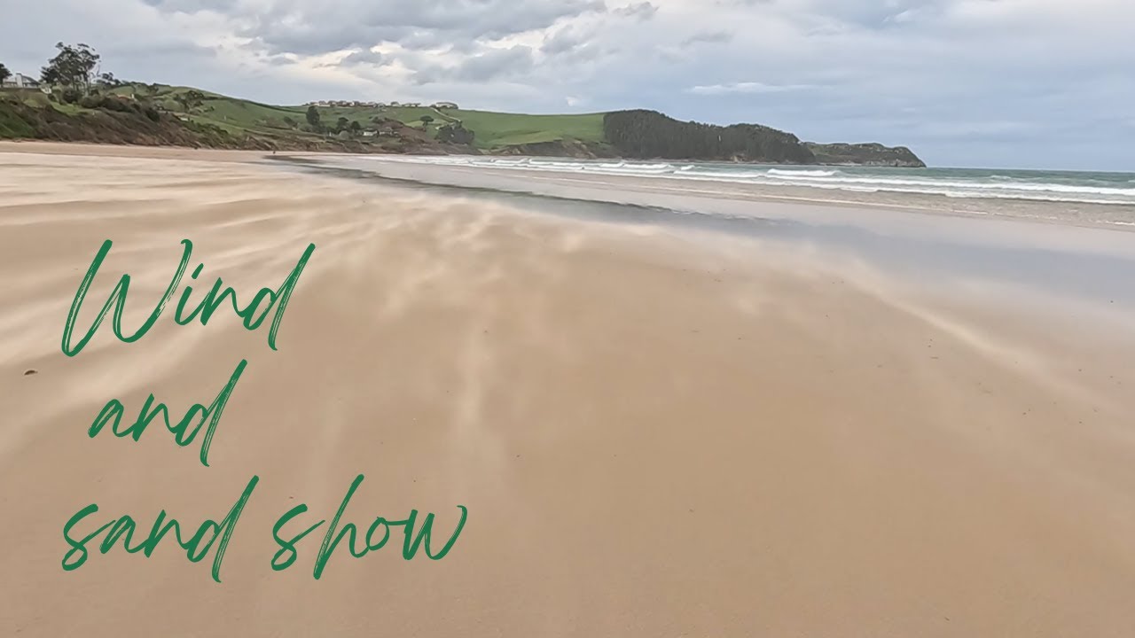 Wind and sand show on the beach - YouTube