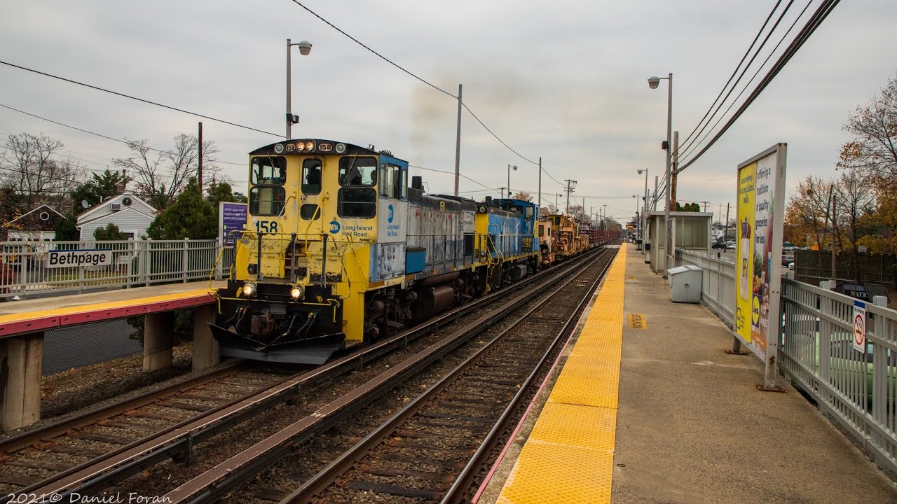 LIRR MP15 158 leads the Welded Rail Train through 🅱️ethpage - YouTube