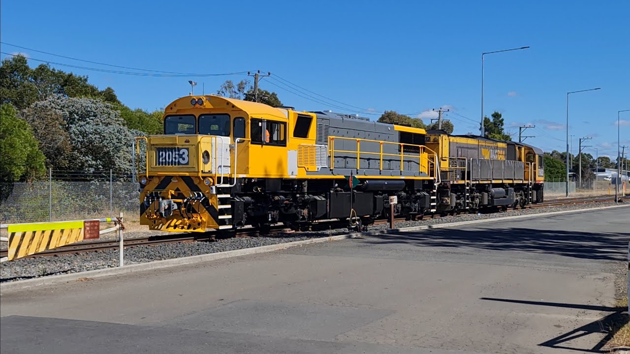 TasRail TR02 2053 (Test run) Light engines crossing Hoblers Bridge Road ...