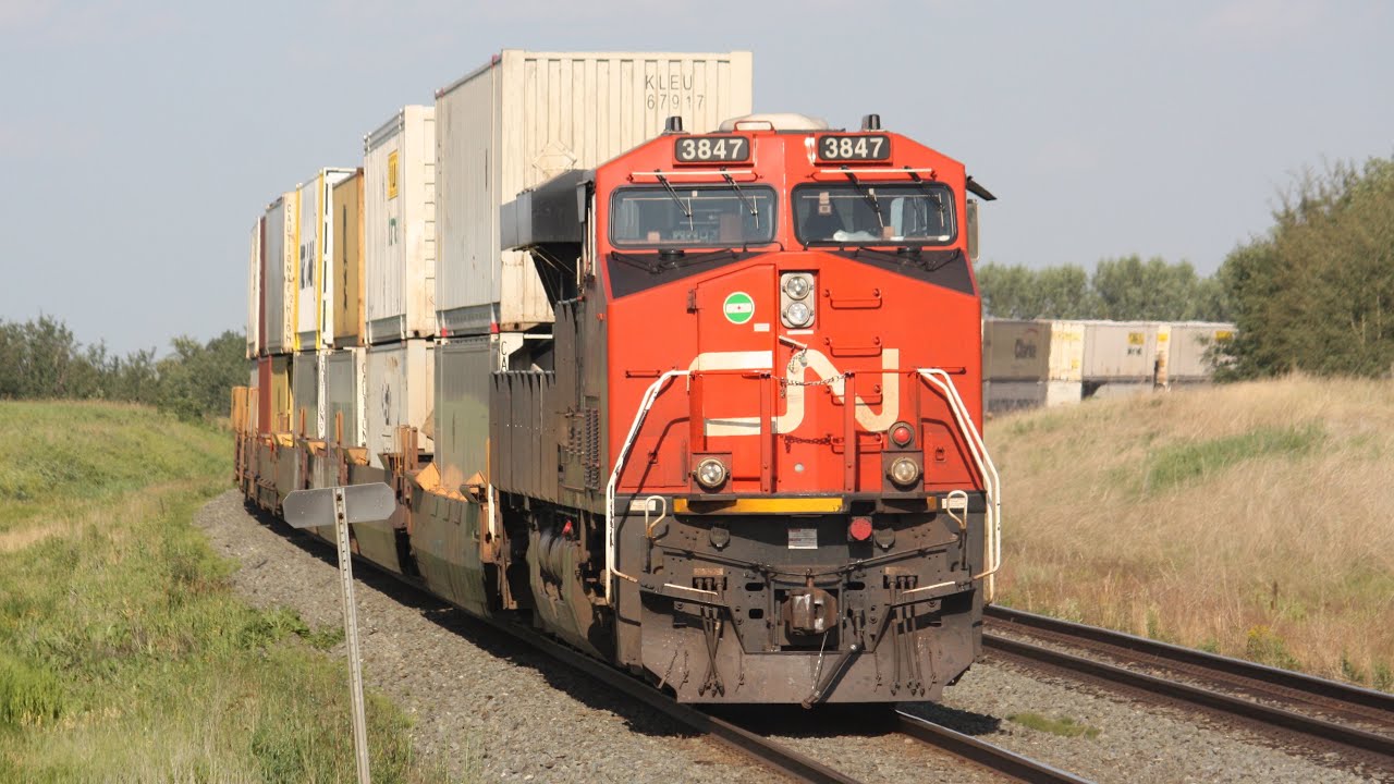SUPER FAST!!!! 75MPH!!!! CN 3863 and CN 3847 Fly CN Q112 east near ...