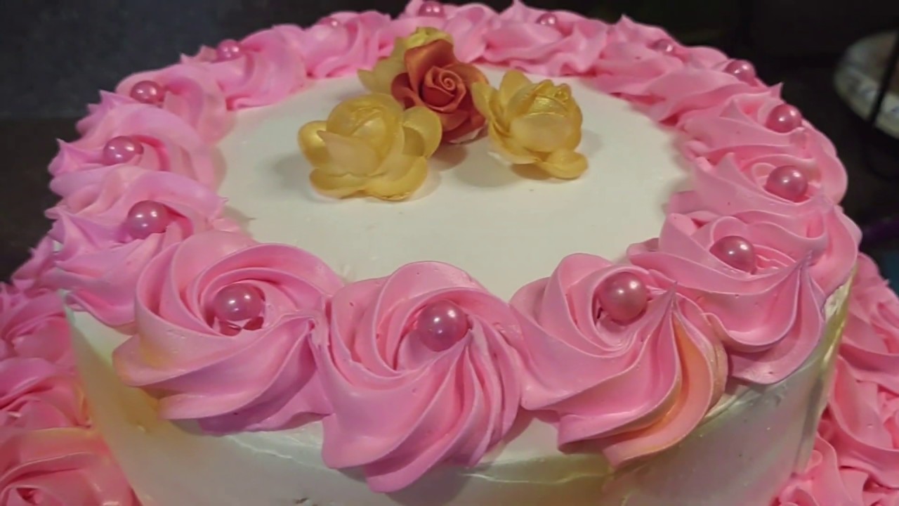 Como decorar un pastel con la duya m1 de wilton para rocetones facil ...
