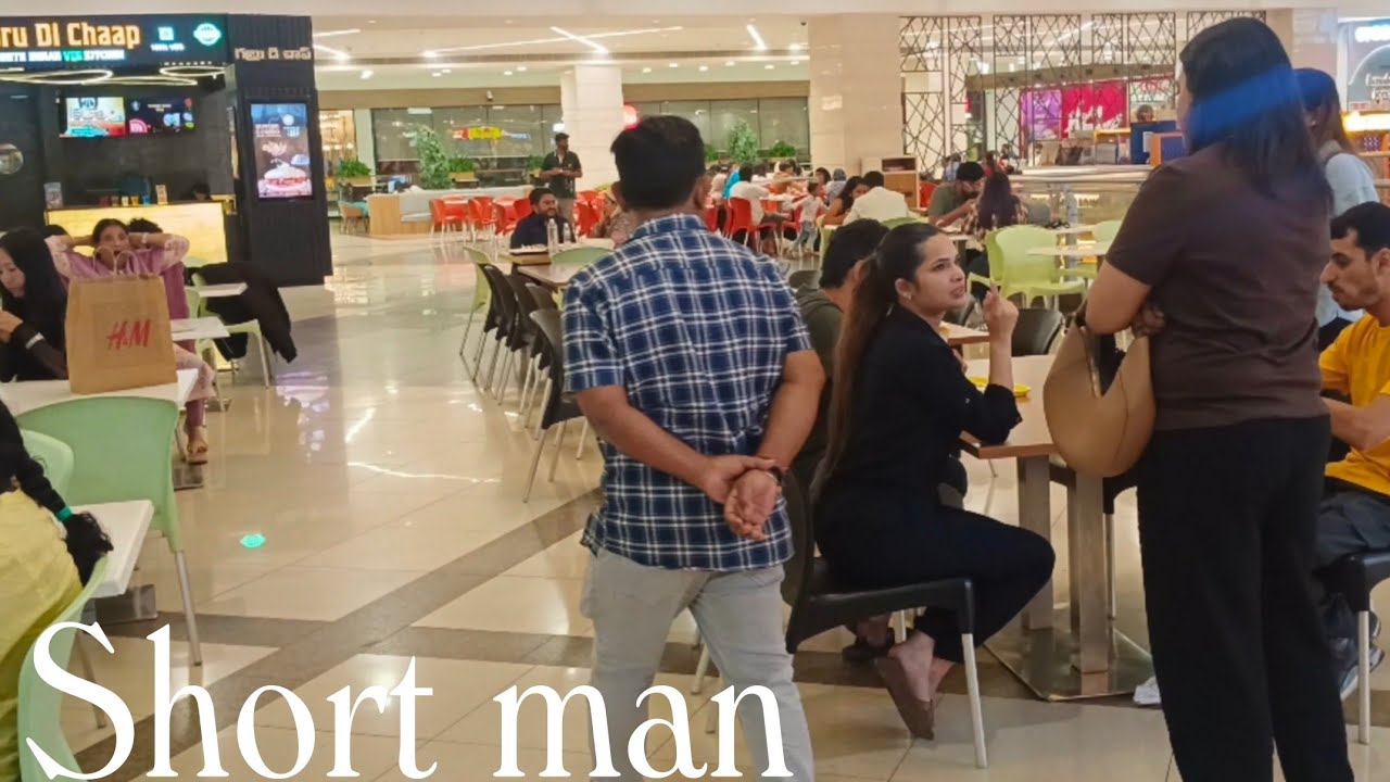 Short man walking in mall | Tall women short man - YouTube