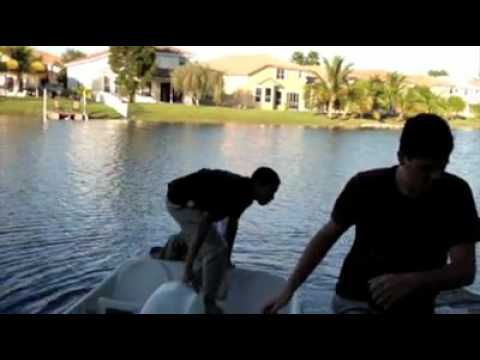 HILARIOUS!!! Guy trips and falls while getting out of boat - YouTube