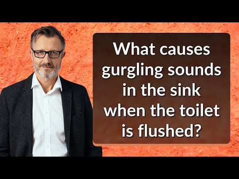 What causes gurgling sounds in the sink when the toilet is flushed?