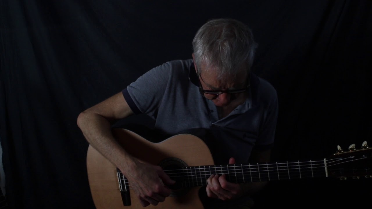 Rick Falkiner plays a Simon Marty/ Robin Moyes cut-a-way classical ...