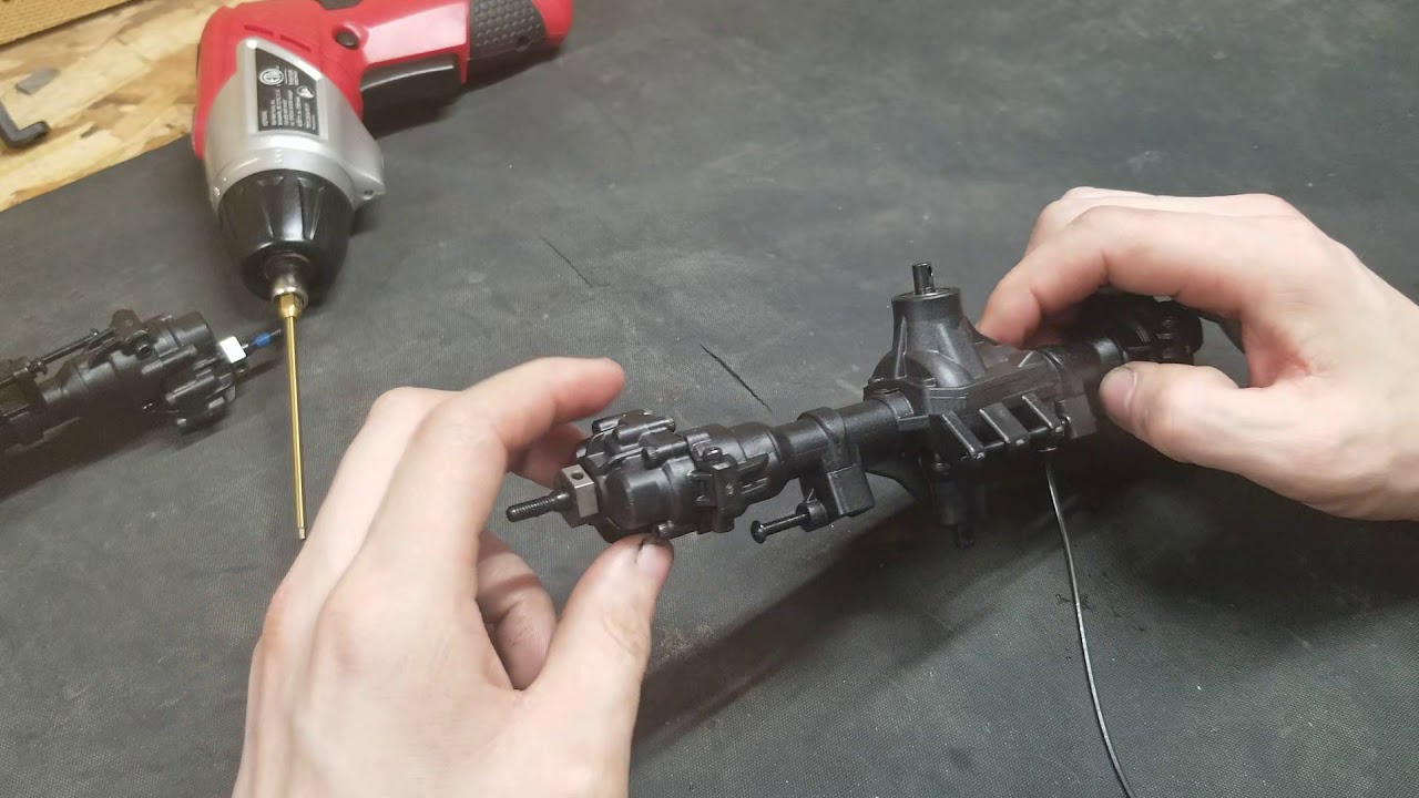 Traxxas trx6 how to remove the rear axles - YouTube