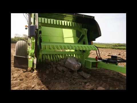 Schulte Windrower and Rock Picker - YouTube
