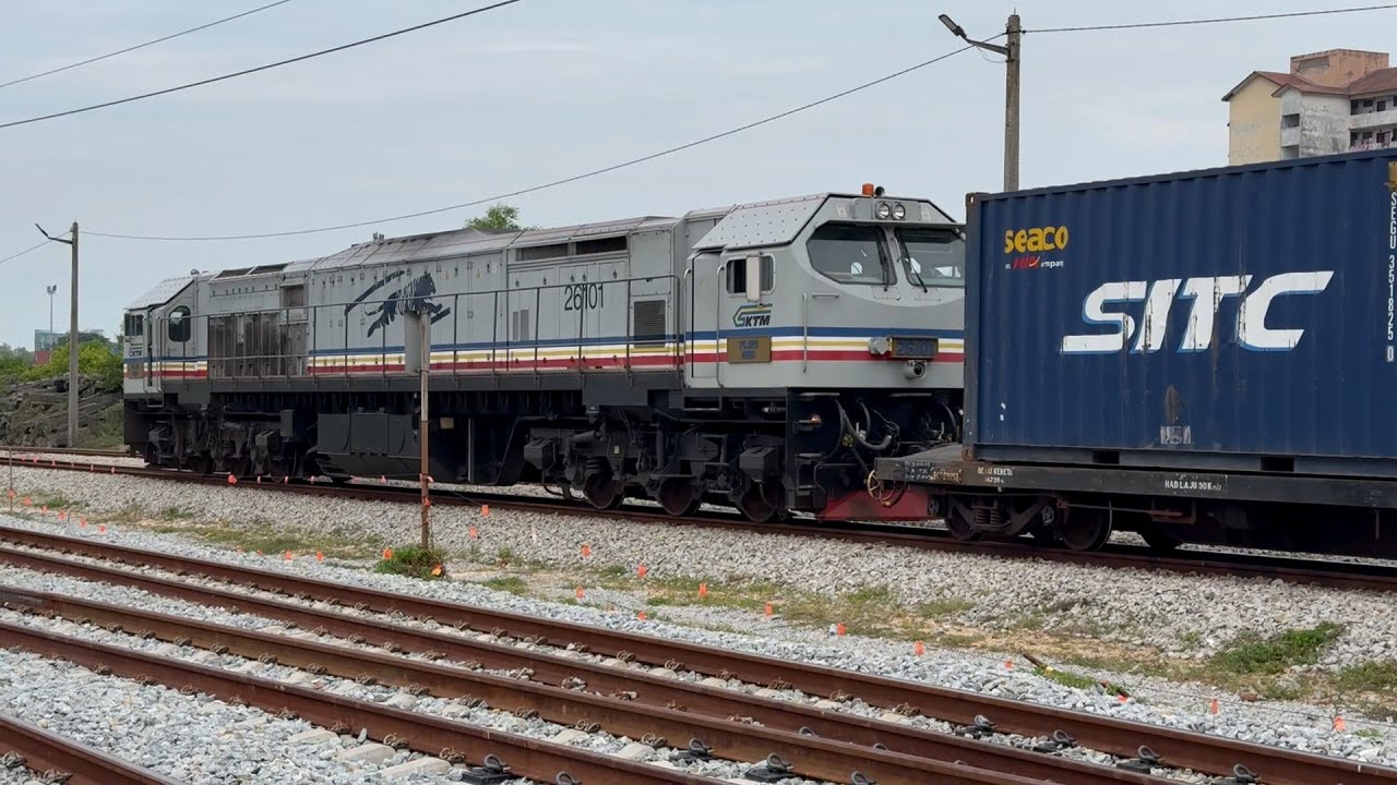 KTMB Class 26101 Tanjung Aru locomotive with container wagons at Jalan ...