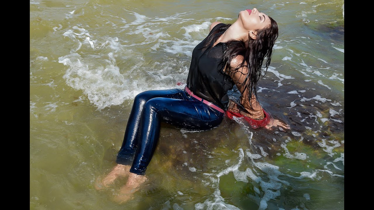 girl after work in the office elegantly poses in wet clothes on the ...