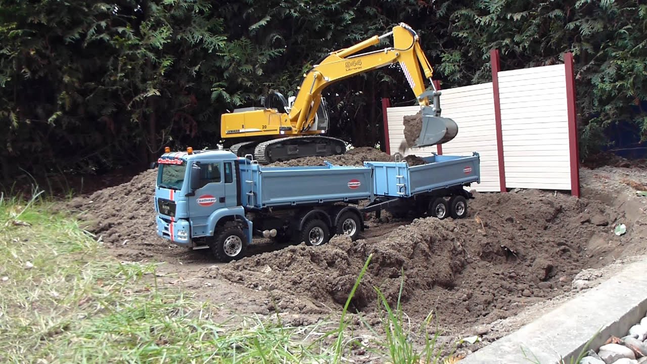 RC CONSTRUCTION SITE WITH LIEBHERR EXCAVATOR AND MAN DUMP TRUCK ...