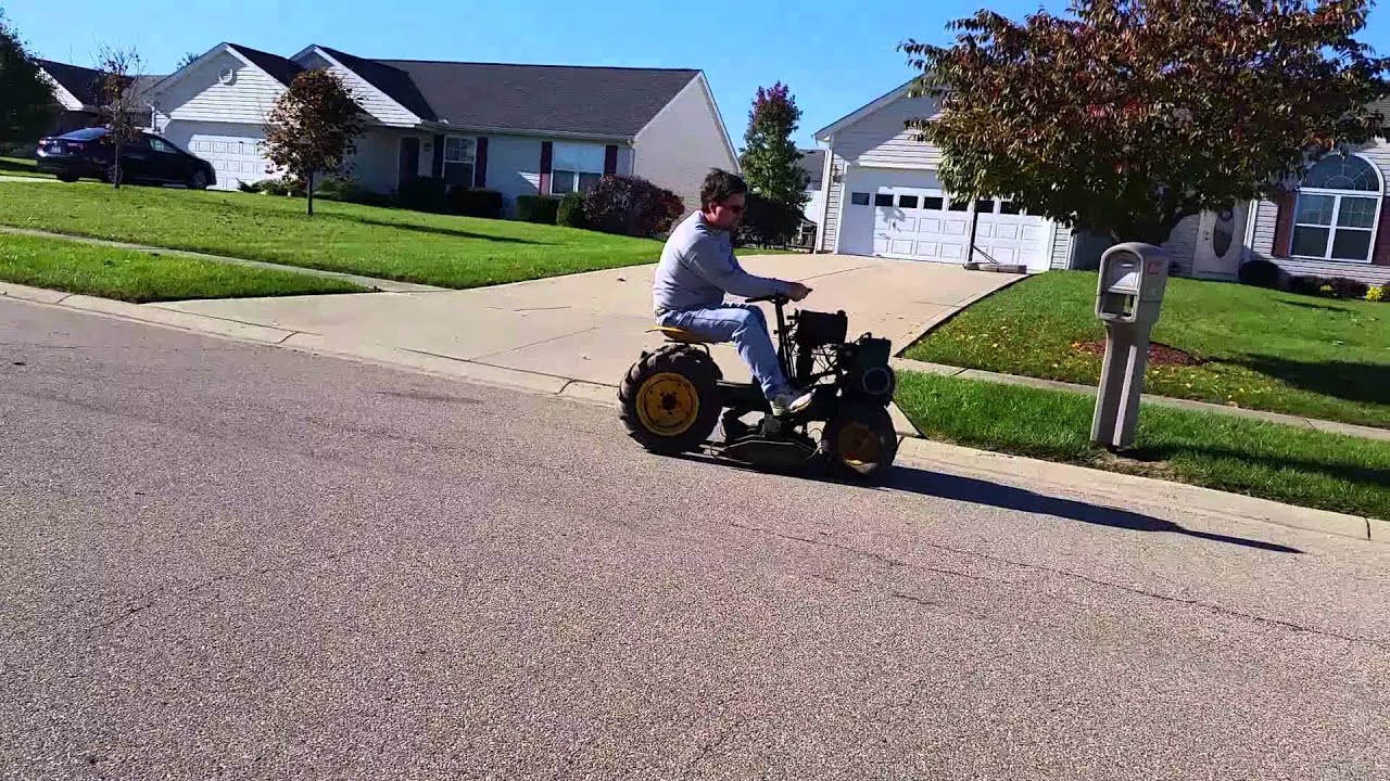 Bolens ride-a matic driving and cutting grass(1) - YouTube