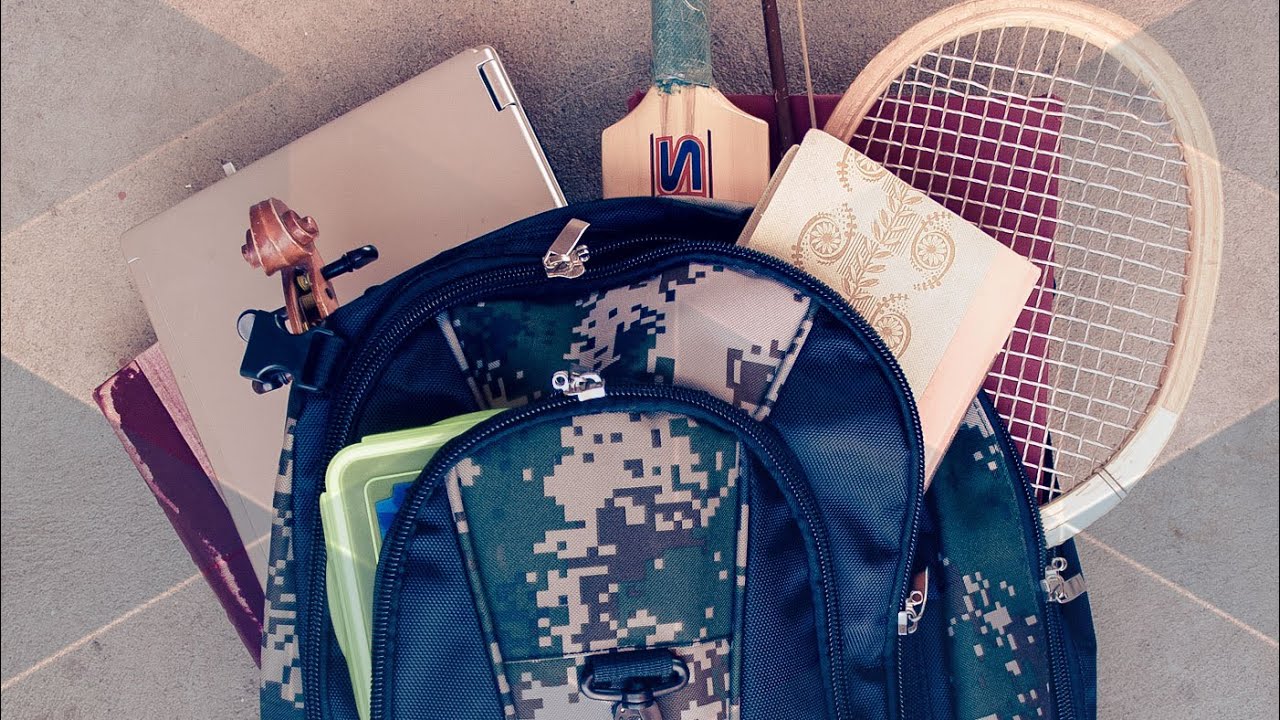 Heavy School Backpacks - Behind the News - YouTube