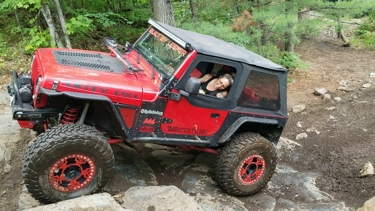 Jeep tj 37s 8.8 swap on greens - YouTube