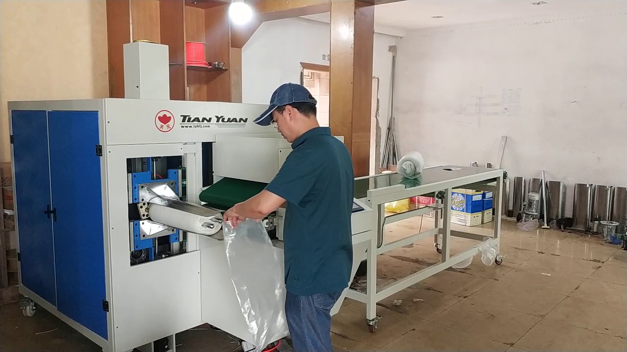 JBJ-9 Pillow rolling machine, comforter rolling machine - YouTube