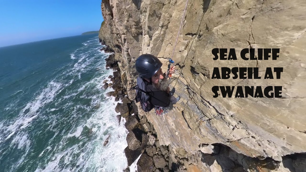Sea cliff abseil at Swanage - YouTube