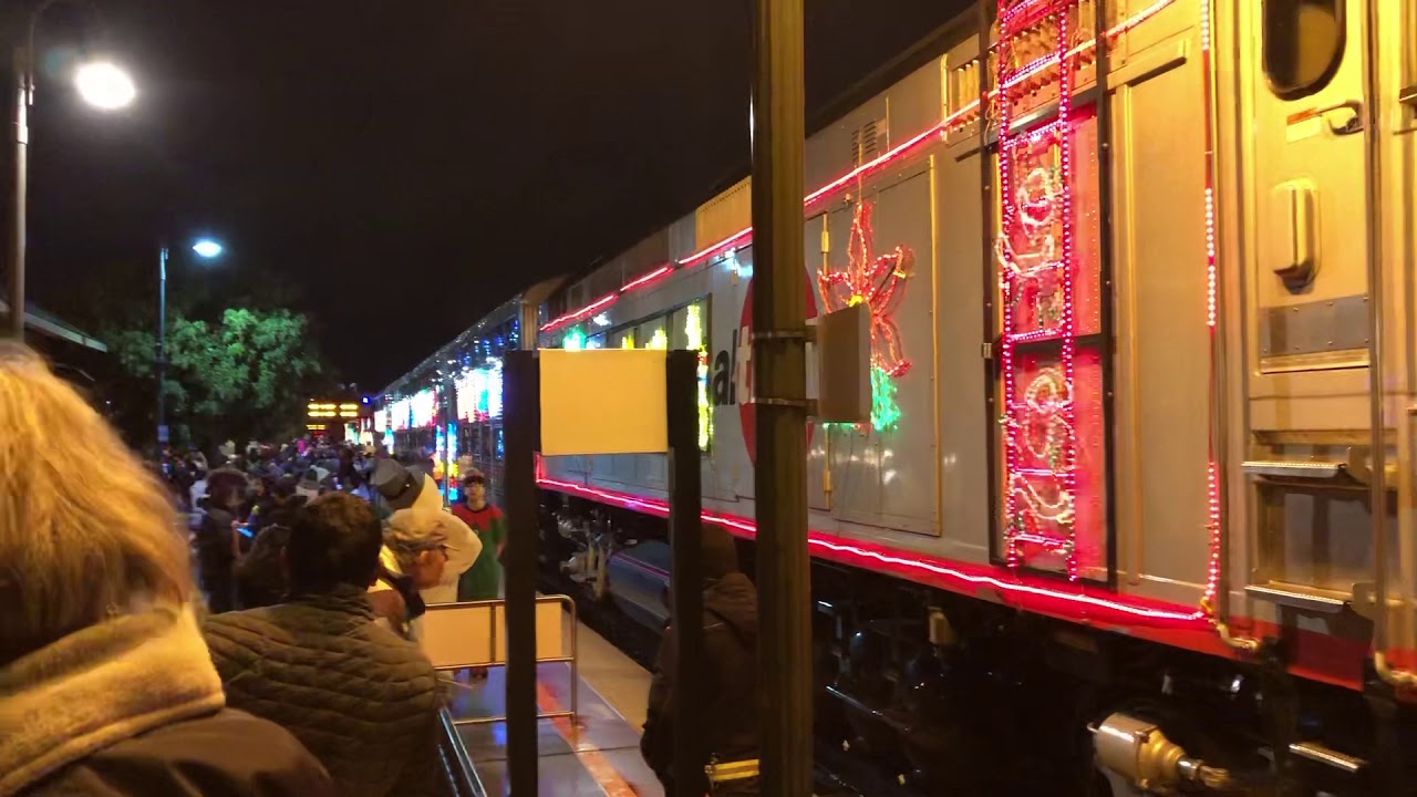 Caltrain Local #430 arrives passed Caltrain Holiday Train - YouTube