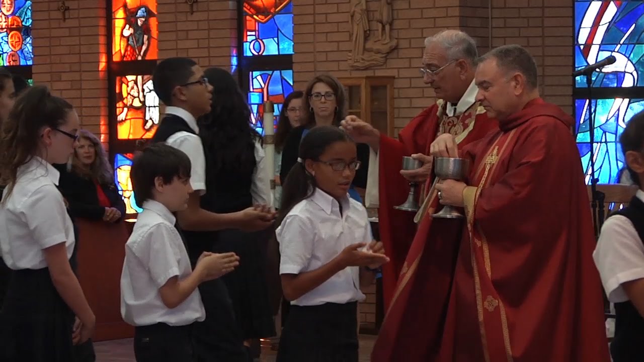Whitestone's Holy Trinity Academy Celebrates New Beginning - YouTube