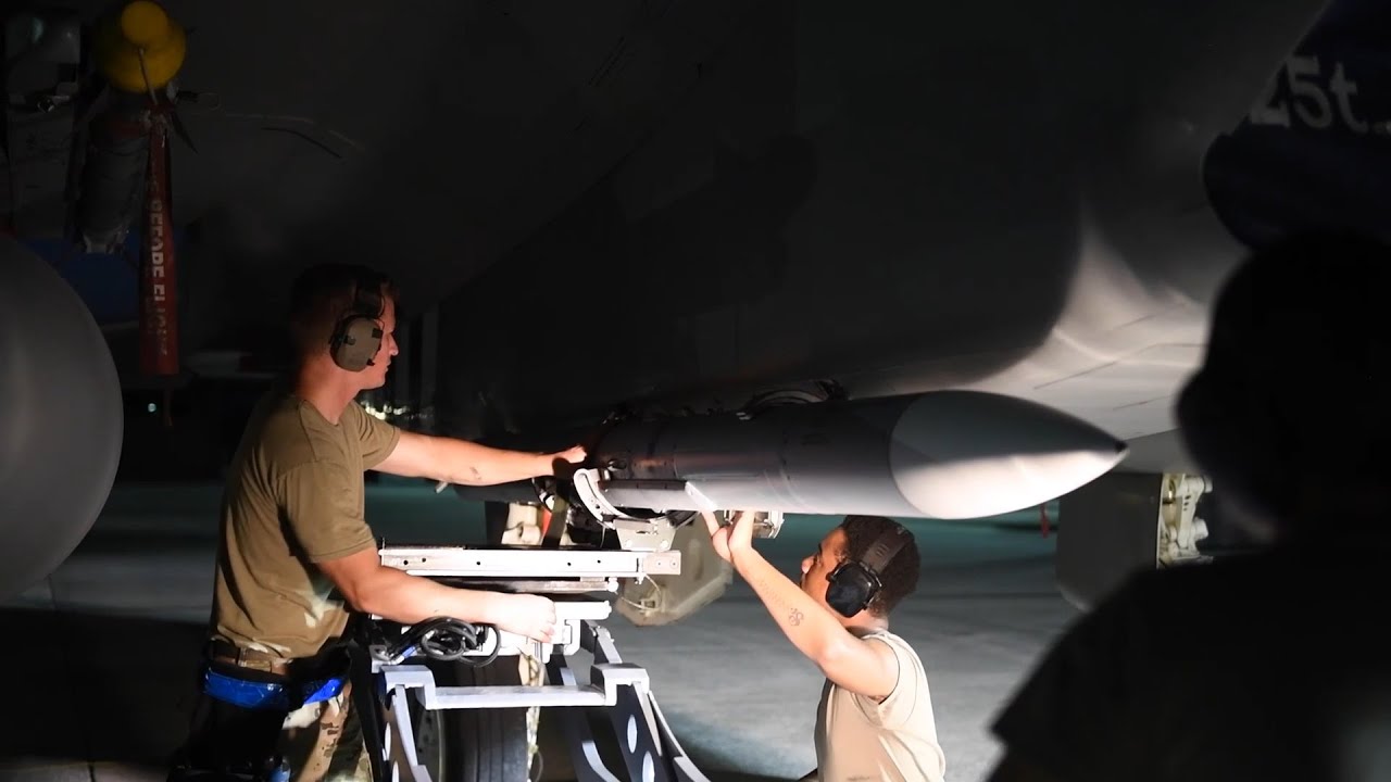 Airmen Load Weapons On F-15C - YouTube