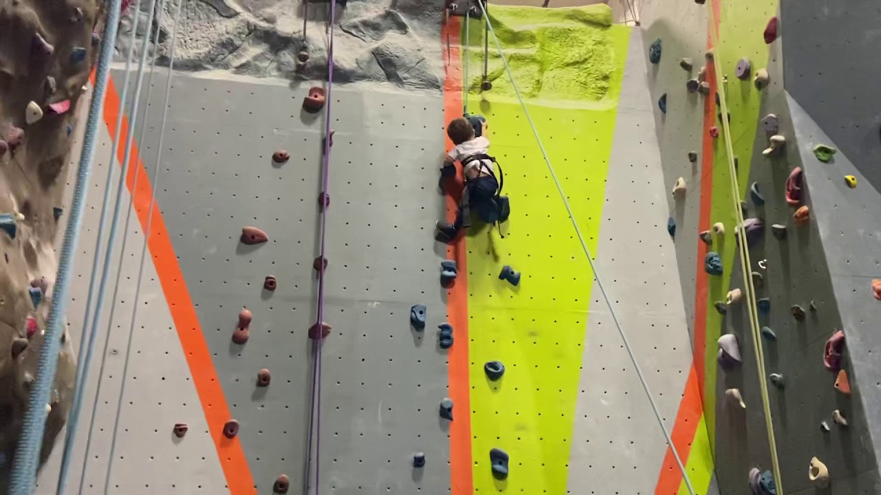 Ryan first class rock wall climbing. - YouTube